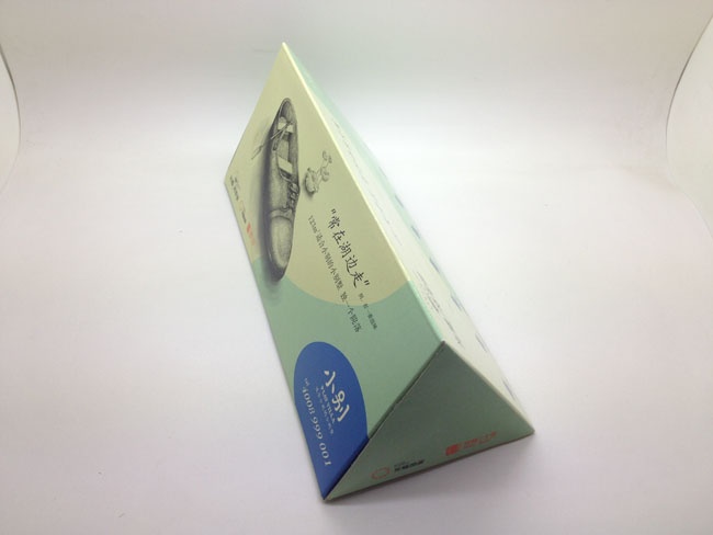 Triangle tissue box for property promotion