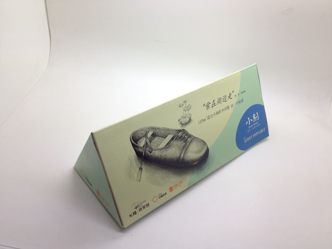 Triangle tissue box for property promotion